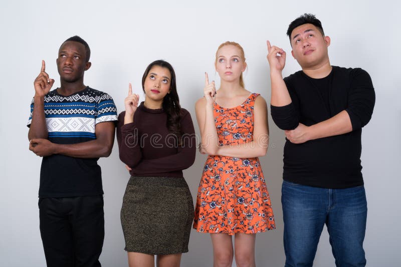 Studio Shot of Diverse Group of Multi Ethnic Friends Thinking an Stock ...