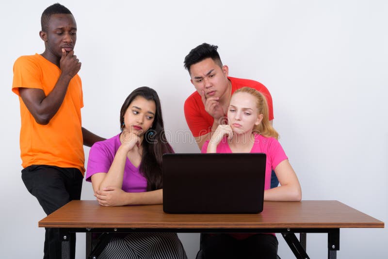 Studio Shot of Diverse Group of Multi Ethnic Friends Thinking Wh Stock ...
