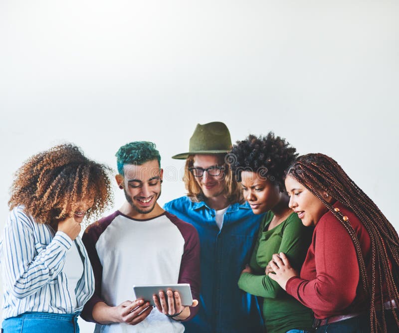 Millennials, the Tech Experts. Studio Shot of a Group of Young People ...