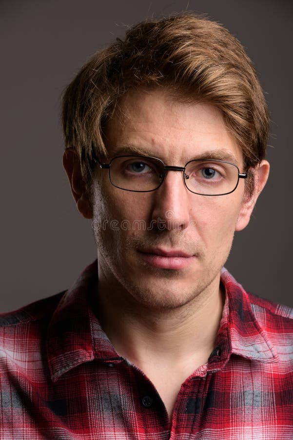 Handsome Man Wearing Eyeglasses Against Gray Background Stock Image ... Handsome Man Wearing Eyeglasses Against Gray Background Stock Image ...