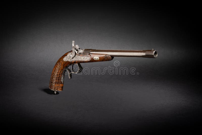 Studio Shot of a Historical Percussion Disc Pistol on Black Background ...