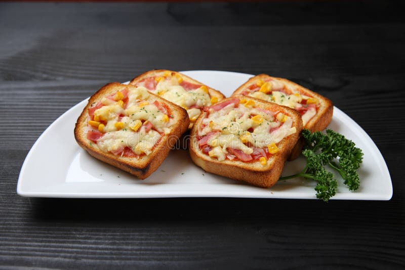 Mini pizza toast stock image. Image of toast, baked - 146624387