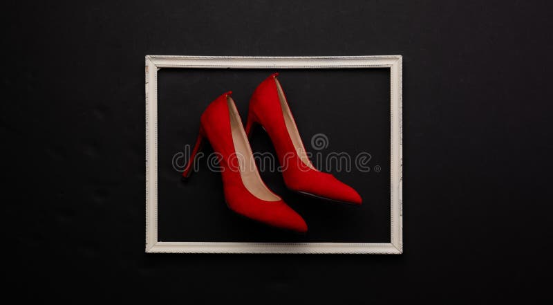 A Studio Shot of Pair of High Heel Shoes on Black Background. Flat Lay ...