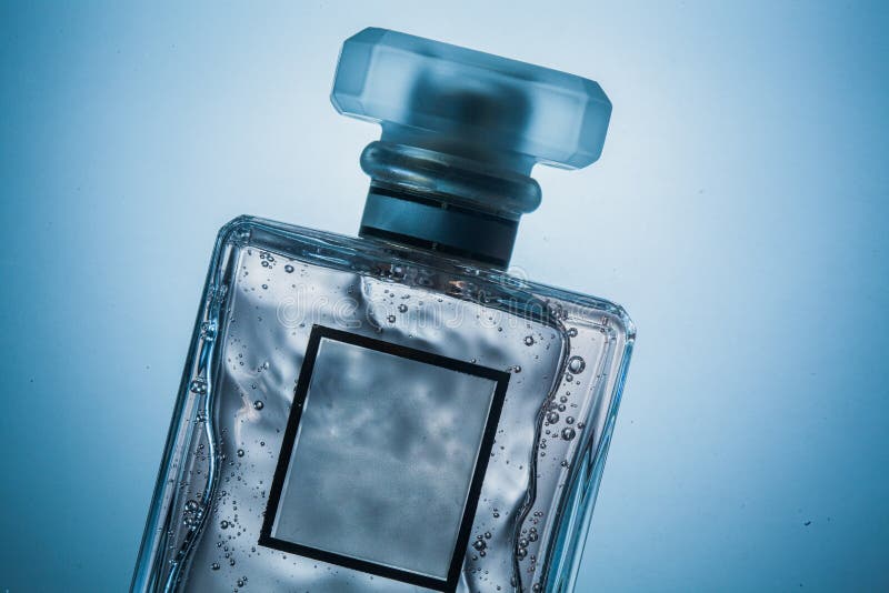 Backlit Perfume Bottle Shot in Studio Stock Photo - Image of luxury ...