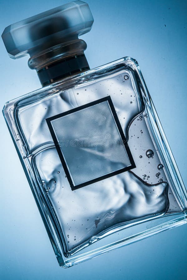 Backlit Perfume Bottle Shot in Studio Stock Photo - Image of cold ...