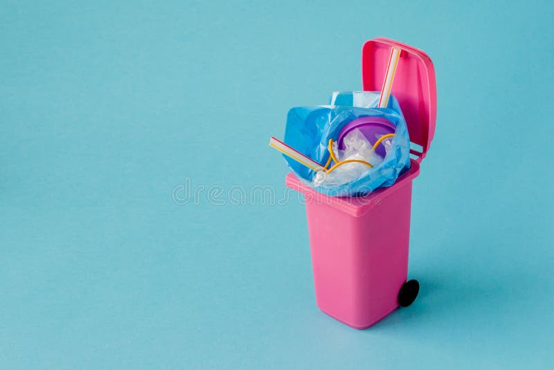 Studio Shot of a Pink Big Trash on Blue Background Stock Image - Image ...