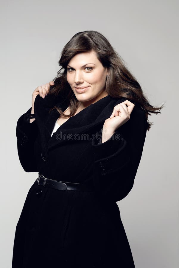Looking Forward To Fall. Studio Shot of a Plus-size Model Posing for ...
