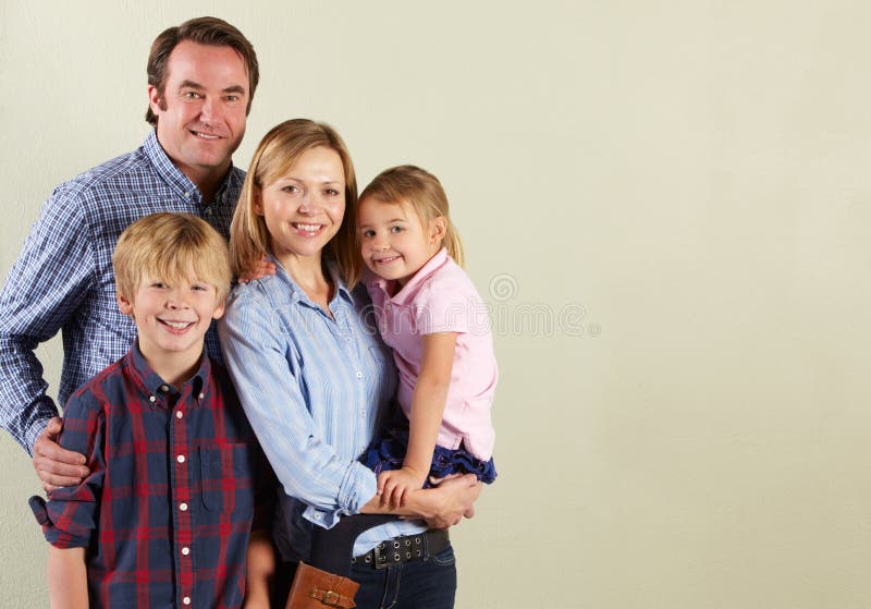 Studio Shot of Relaxed Family Stock Photo - Image of four, embracing ...