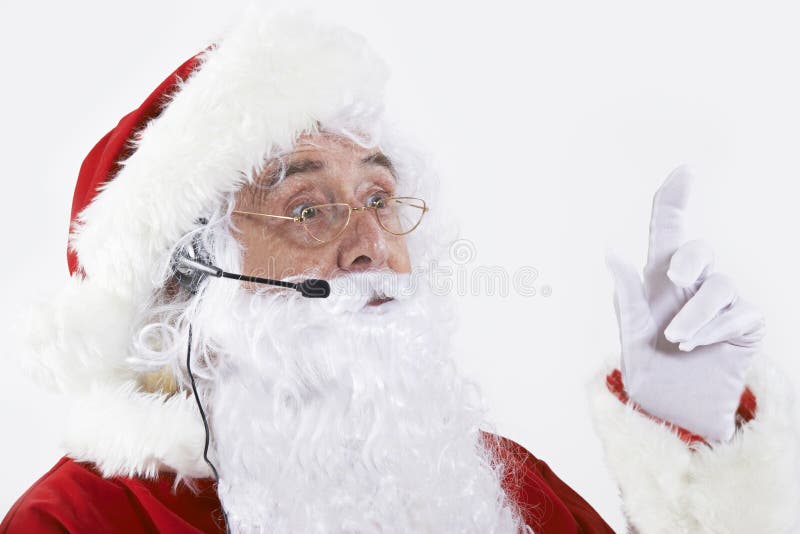 Close Up of Santa Claus Holding Television Remote Control Stock Photo ...
