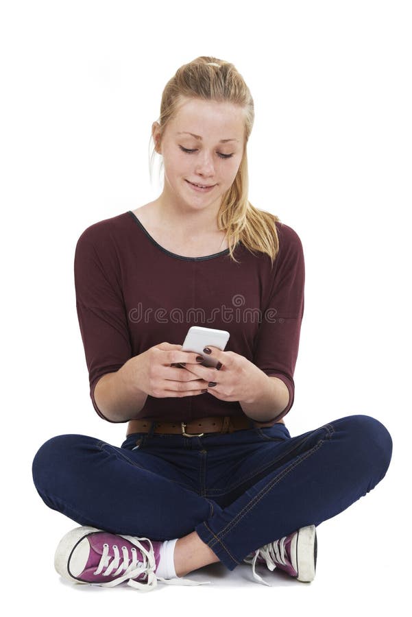 Studio Shot of Teenage Girl Sending Text Message Stock Photo - Image of ...