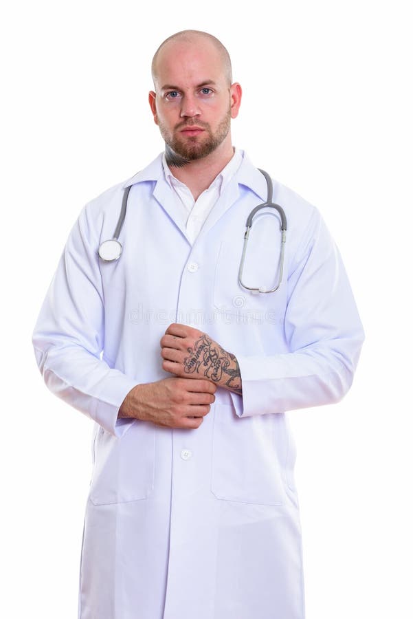 Studio Shot of Young Bald Muscular Man Doctor Stock Photo - Image of ...