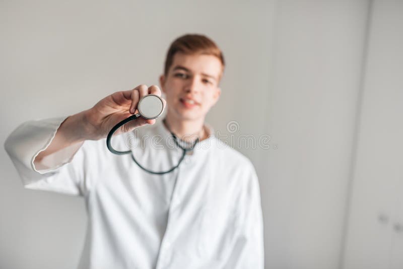 Studio Shot of Young Doctor Guy Student in the Clinic in Practice Stock ...