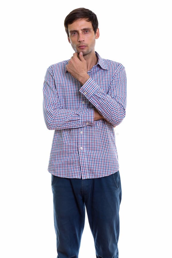 Studio Shot of Young Handsome Businessman Standing while Thinkin Stock ... Studio Shot of Young Handsome Businessman Standing while Thinkin Stock ...