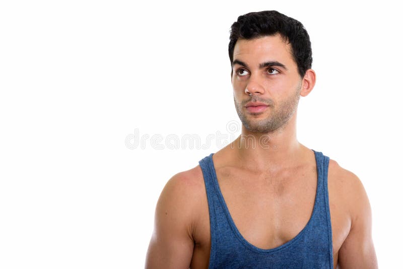 Studio Shot of Young Handsome Hispanic Man Thinking while Lookin Stock ...