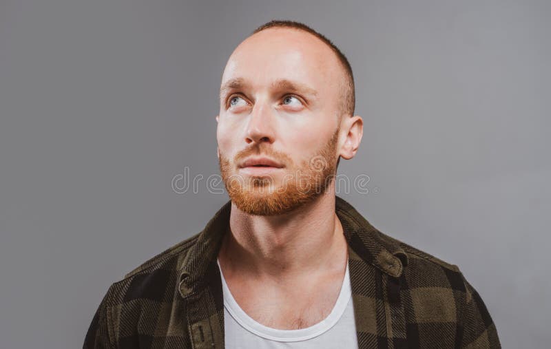 Studio Shot of Young Man Looking Up. Handsome Guy with Confident Face ...