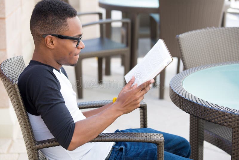 Studious guy stock photo. Image of book, books, african - 42967816
