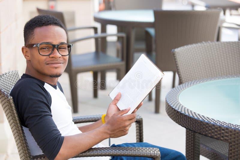Studious guy stock photo. Image of book, books, african - 42967816