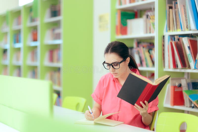 Students writing an essay stock image. Image of searching - 21146389