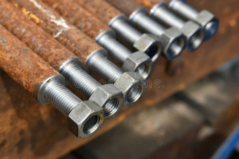 Studs with Threaded Threads and Nuts after Production on a Cnc Lathe ...