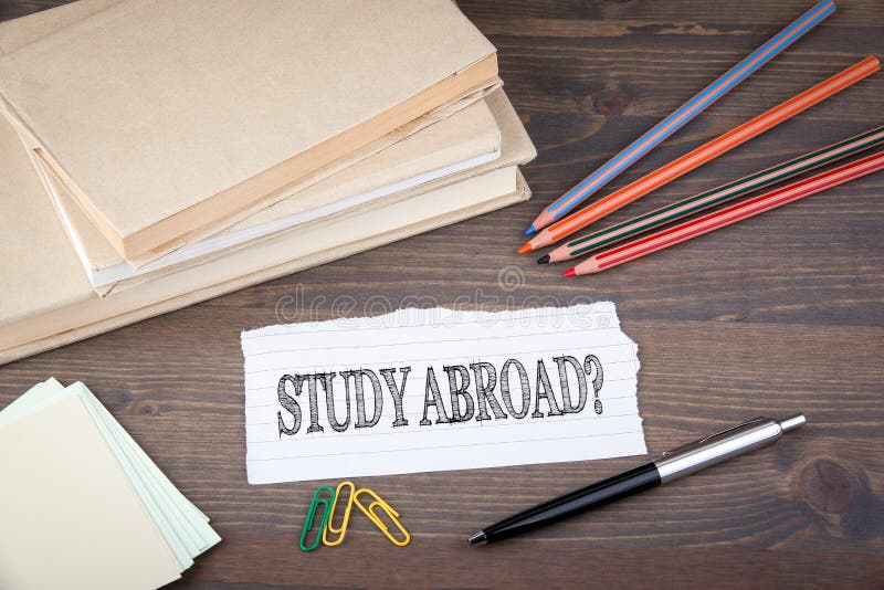 Study Abroad. Paper Sheet from the Booklet on the Wooden Table Stock ...