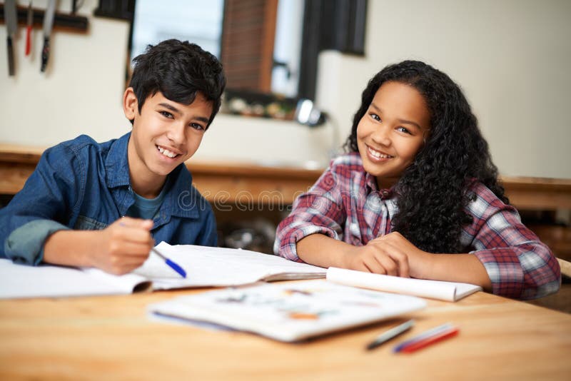 Study Buddies Make Homework Easier. Two Young Students Studying ...