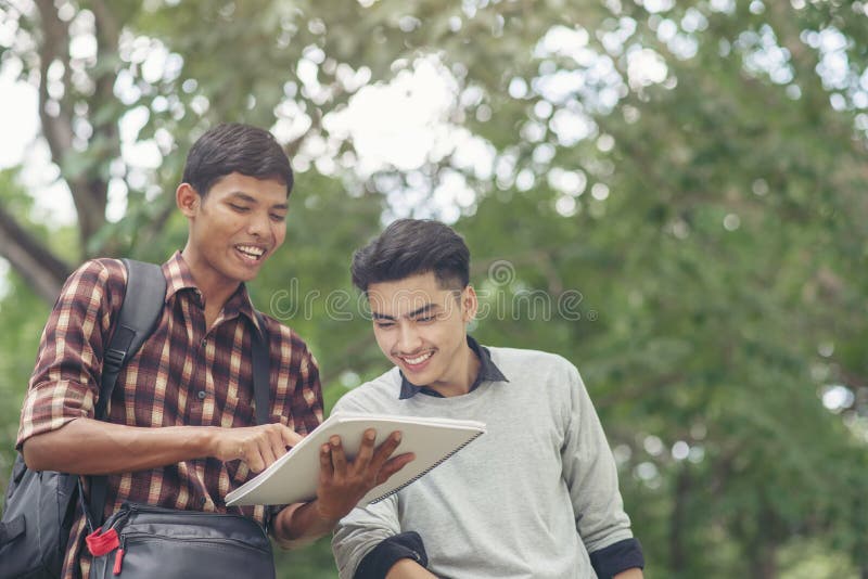 Study Concept.Asian Students Reading Book,studying for an Exam at ...