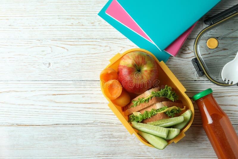 Study Concept with Lunch Box on White Wooden Table Stock Image - Image ...