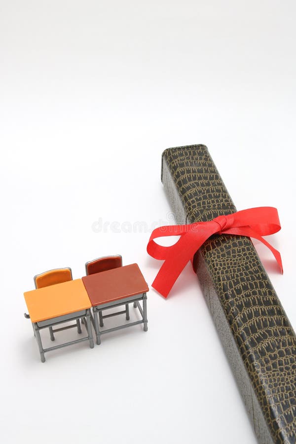 Study Desks and Diploma with a Red Ribbon on White Background. Stock ...