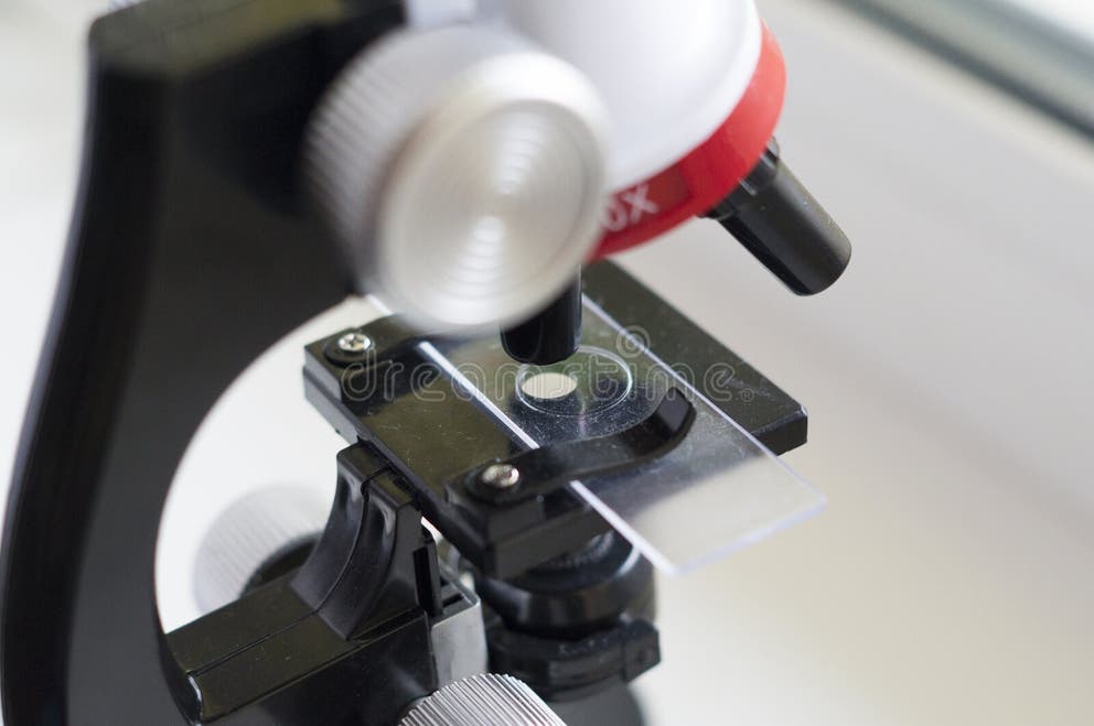 Study of Dust Under a Red Microscope Stock Image - Image of microscope ...