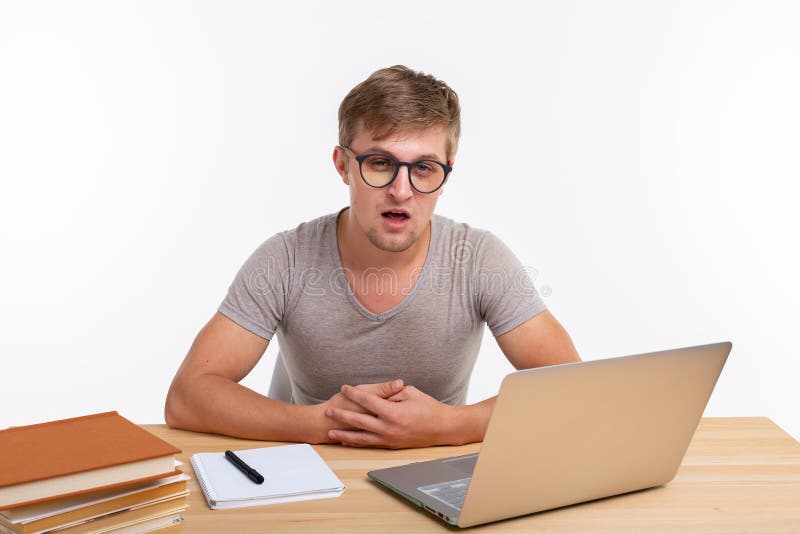 Study, Education and Emotions Concept - Male Student Doing Exercises in ...