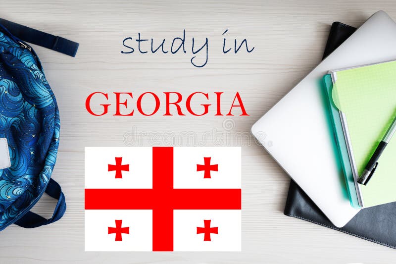 Study in Georgia. Background with Notepad, Laptop and Backpack Stock ...