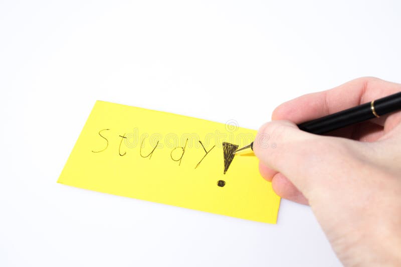 Study Handwrite with a Pen and a Hand on a Yellow Paper Stock Image ...