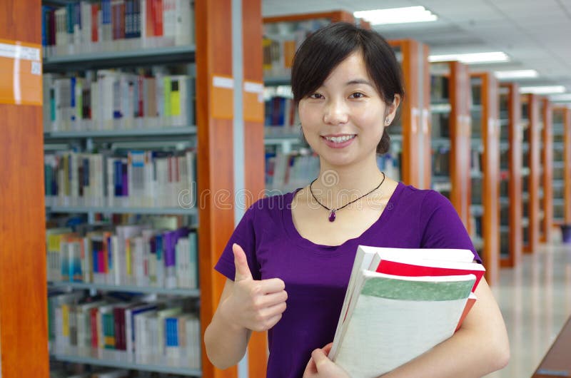 Study in a library stock photo. Image of intelligence - 25784796