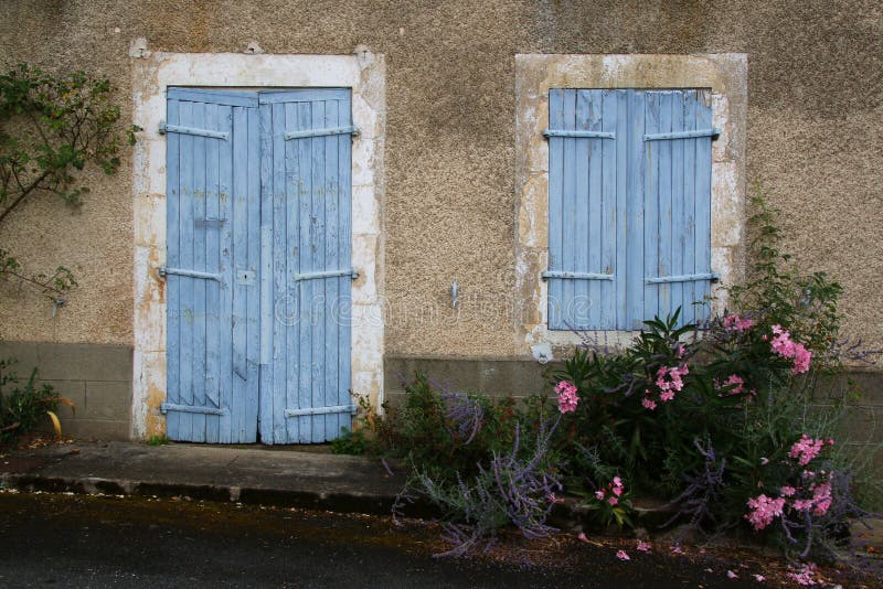 A Study of an Old Blue Wooden Door and Shuttered Window Stock Image ...