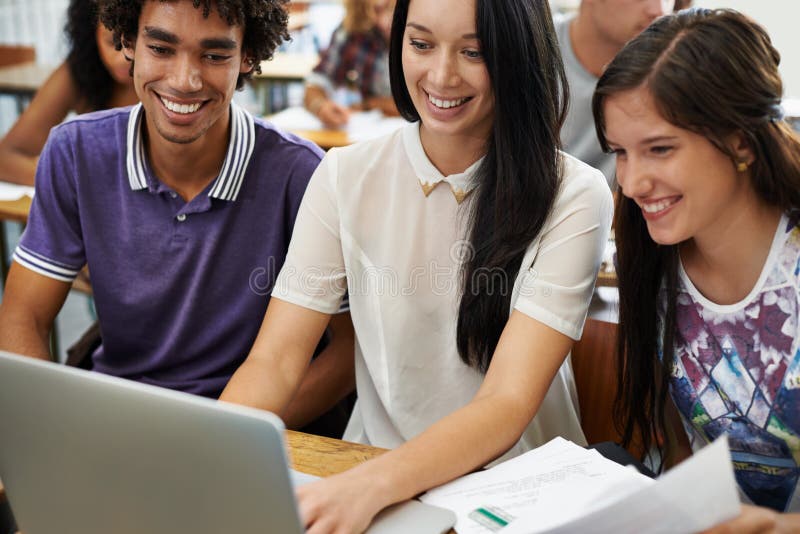 Study Partners. a Young Male and Female Student Studying in a Classroom ...