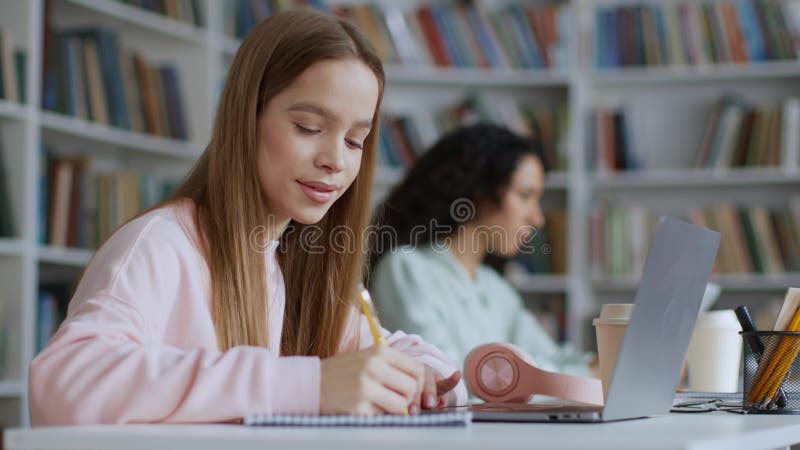 Study Process. Young Pretty Lady Student Writing Homework in Copy Book ...