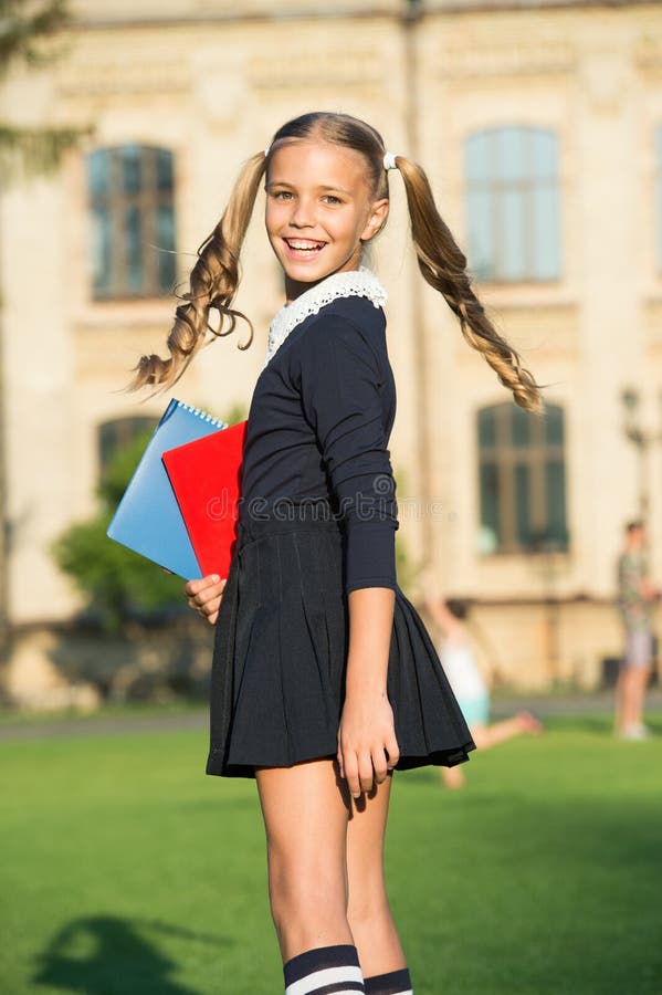 Study Smart. Happy Girl Study in Primary School. Little Child Hold ...