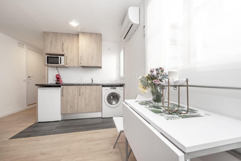 Study with Square White Folding Table, Open Kitchen Stock Image - Image ...