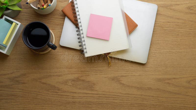Study Table with Notebook, Coffee Cup, Laptop, Stationery and Copy ...