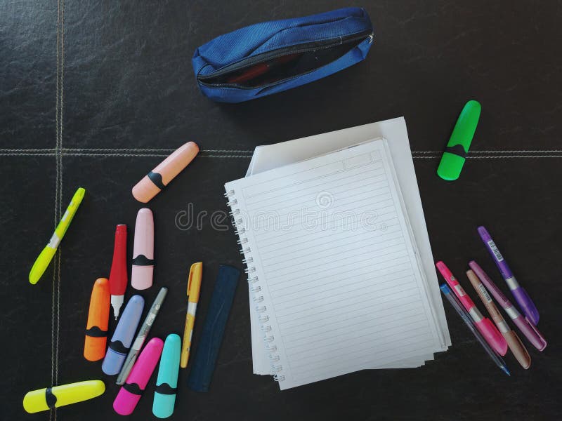 Study Table with Notebook and Writing Tools Stock Photo - Image of ...