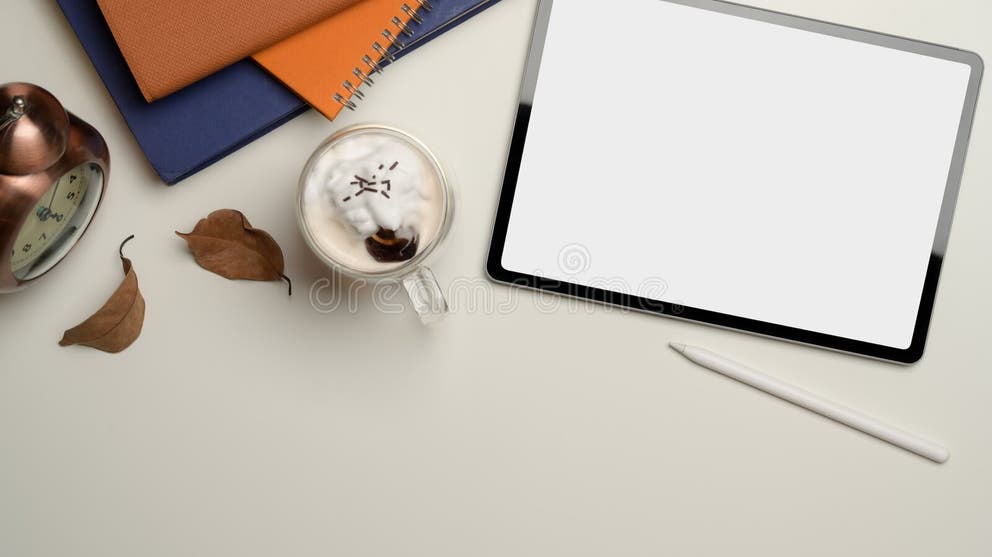 Study Table with Tablet, Stationery, Cup of Beverage, Decoration and ...