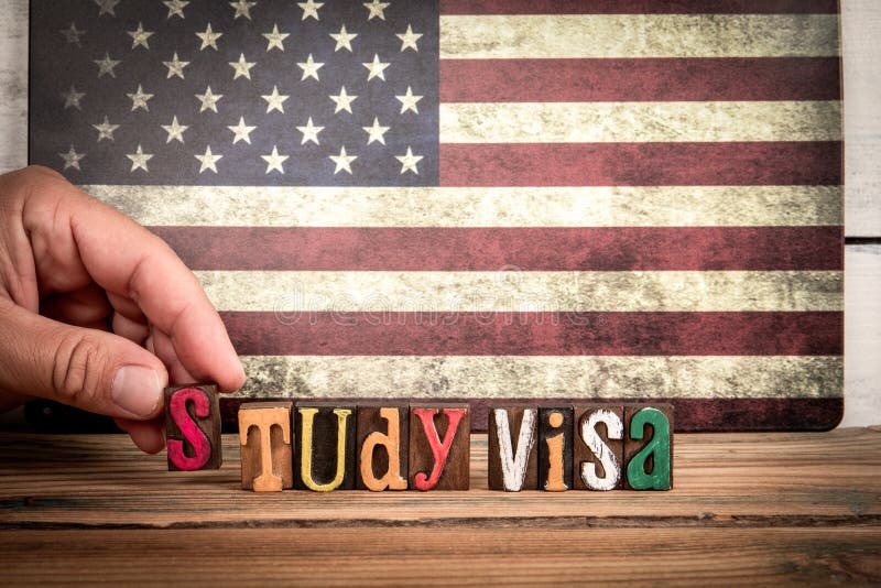 STUDY VISA. Colorful Letters of the Alphabet on a Wooden Texture Table ...