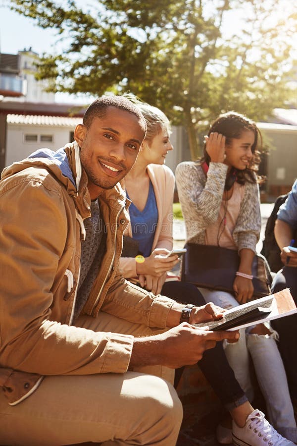 Studying is Actually Pretty Fun. Portrait of a Student Studying Outside ...