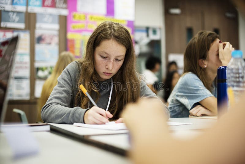 Studying in the Classroom with Friends Stock Image - Image of group ...