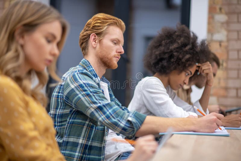 Group of Students Having a Class and Looking Contented Stock Image ...