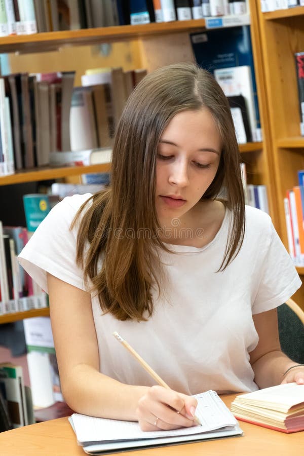 Studying hard stock photo. Image of casual, paper, learn - 161057120