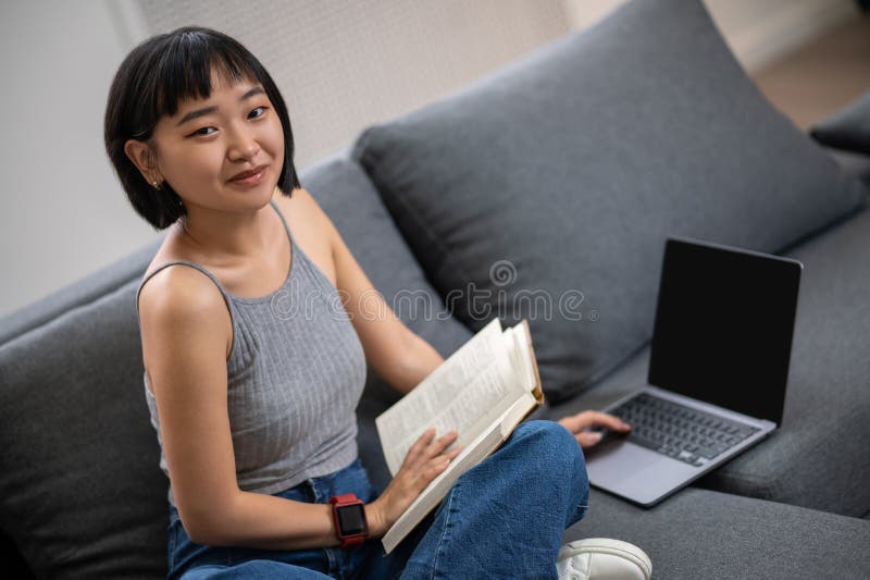 Asian Young Girl Sith a Book Studying at Home Stock Image - Image of ...