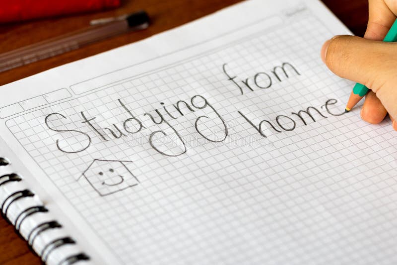 `Studying from Home` Phrase Being Written on a Notebook with a Pencil ...