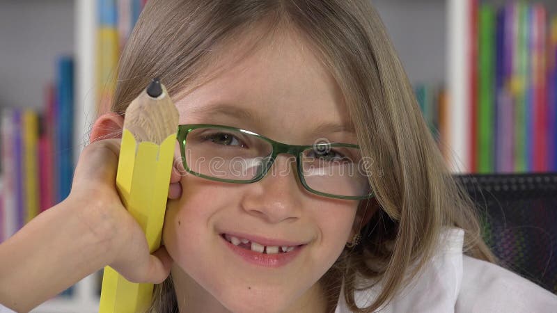 Studying Student Child Smiling at Camera in Library, School Girl ...
