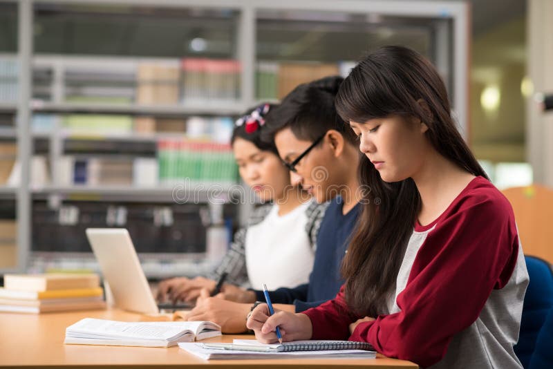 Studying teenagers stock image. Image of vietnamese, library - 51026251